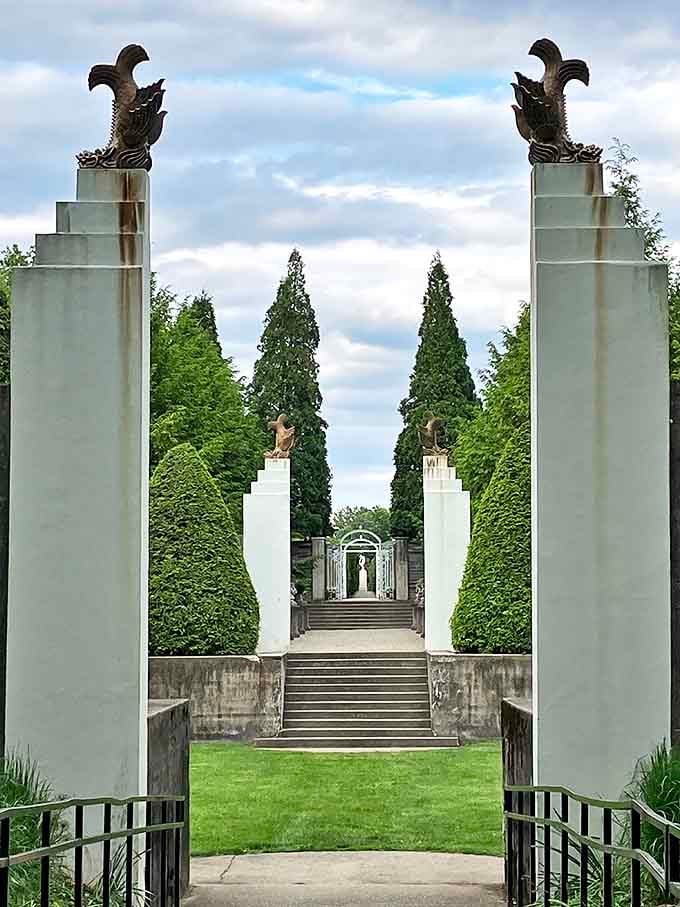 Sunken Garden: Towering pillars frame this dramatic entrance like nature's version of a red carpet. VIP access to tranquility!