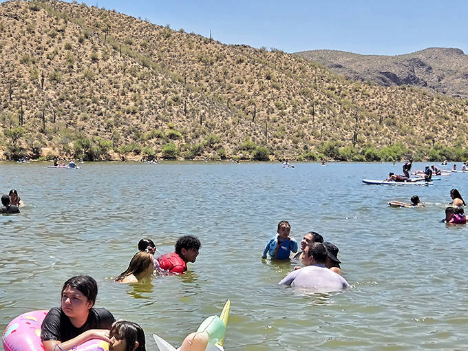 Families cool off in Saguaro Lake's refreshing waters, where desert temperatures meet their match in this unexpected aquatic playground.