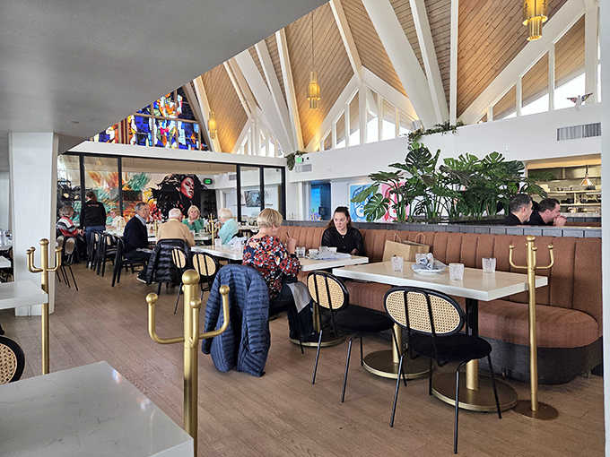 The thoughtful interior design balances the building's architectural heritage with contemporary comfort, creating spaces that invite lingering over exceptional meals.