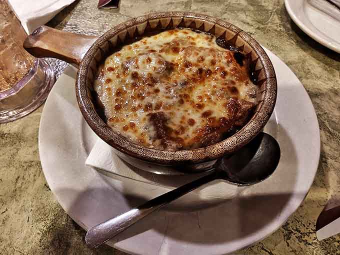 French onion soup bubbling with melted cheese is the kind of starter that makes you glad you wore elastic waistbands.