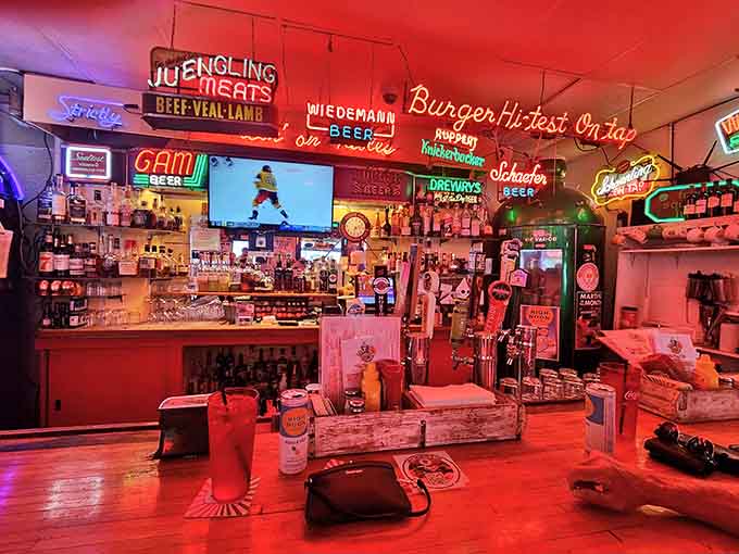 This bar area has seen more good times than your uncle's favorite fishing stories, and the neon proves it.