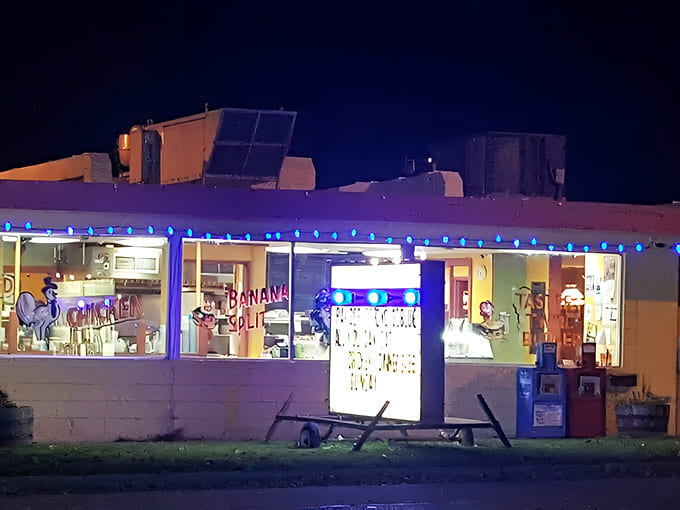 As darkness falls, The Twirl transforms into a blue-lit beacon for hungry travelers &ndash; a midnight oasis of comfort food.