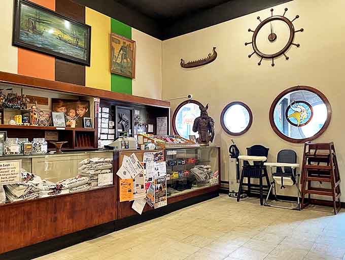 At the counter, where regulars perch like they're part of the furniture, coffee flows freely and conversation never runs dry.