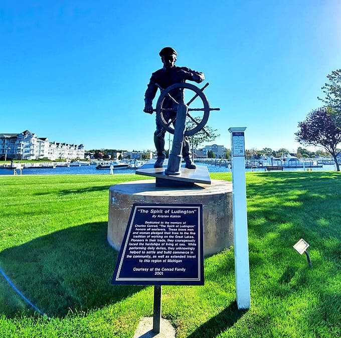 The Spirit of Ludington statue honors maritime heritage while silently judging your inability to parallel park near the marina.