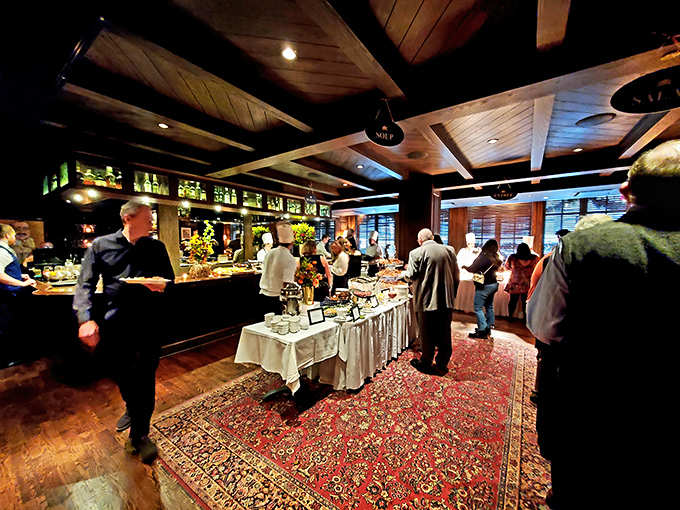 The warm wooden interior transforms an ordinary evening into something extraordinary, where conversations flow as smoothly as the wine.