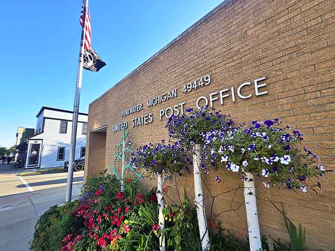 Even Pentwater's post office delivers charm, with flower displays brightening the brick building where community news travels as fast as mail.