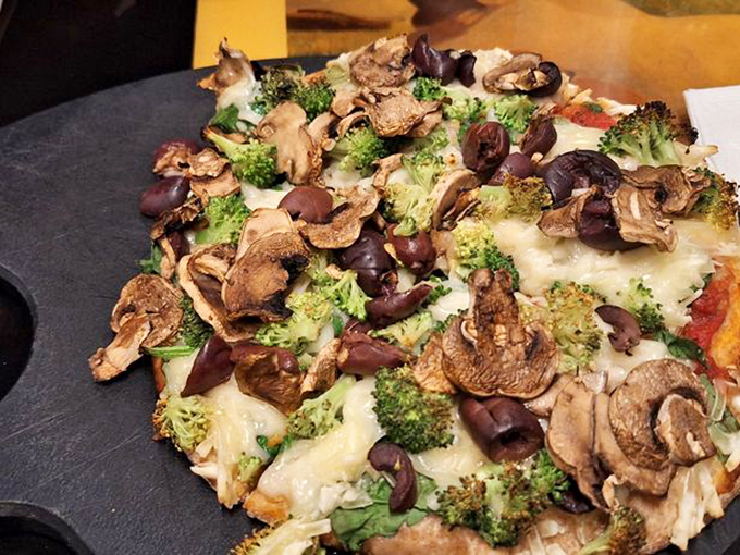 A vegetable-topped creation proves that plant-based pizzas can be just as visually stunning and flavor-packed as their meaty counterparts.