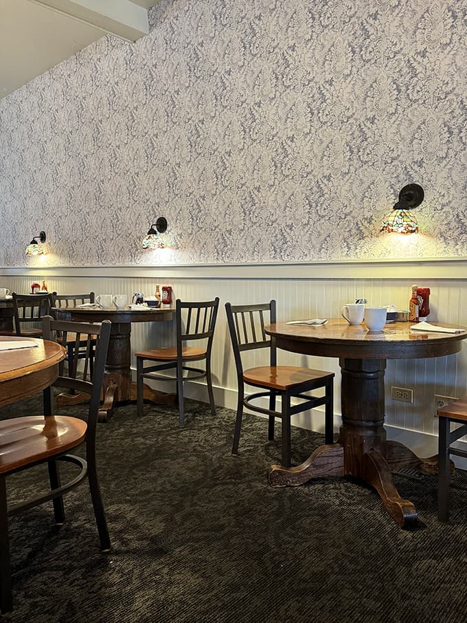 The dining area balances cozy intimacy with spacious comfort, creating the perfect setting for everything from solo coffee contemplation to family celebrations.