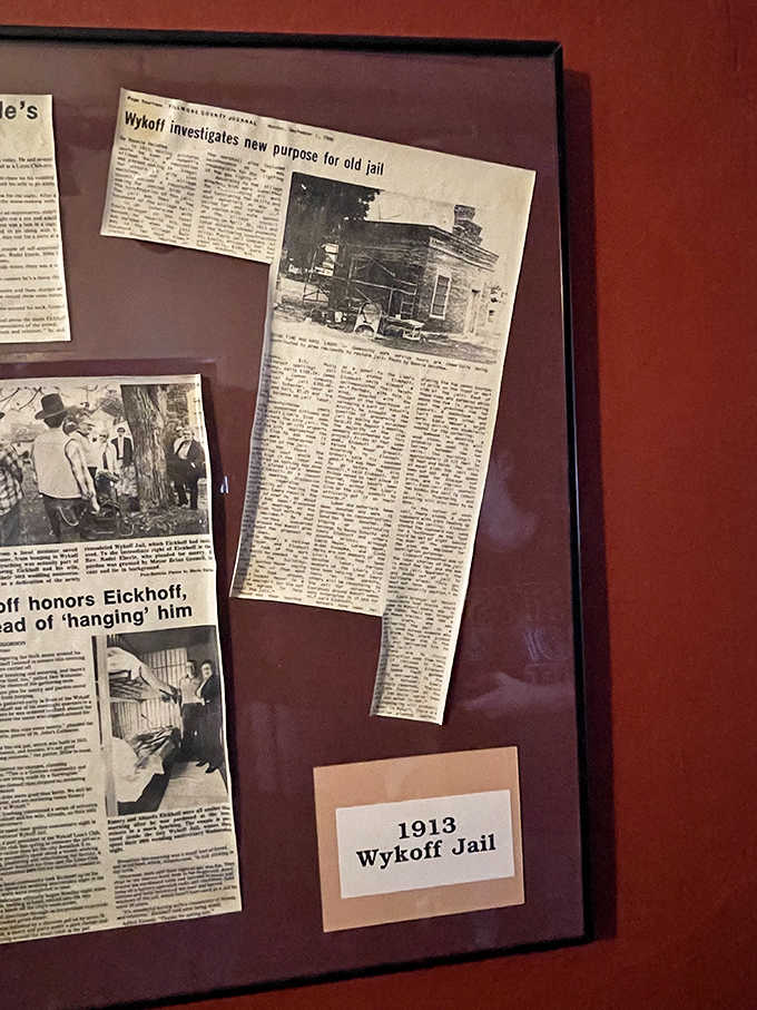 Framed newspaper clippings tell the fascinating story of this 1913 jailhouse, preserving local history for curious guests to discover.