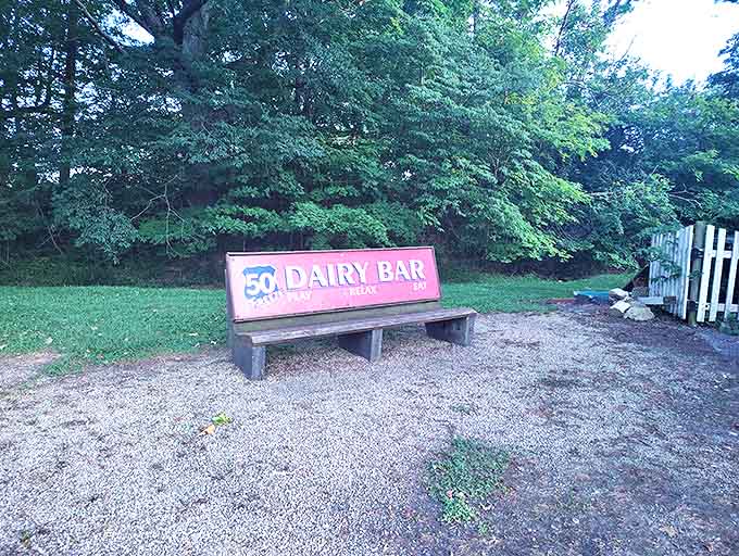 A bench fashioned from the original Dairy Bar sign &ndash; where visitors rest between rounds of golf, often with melting cones in hand.