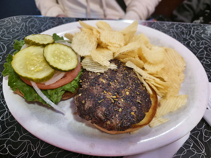 A burger that doesn't need fancy toppings or a clever name &ndash; just quality beef, proper seasoning, and the confidence of decades at the grill.