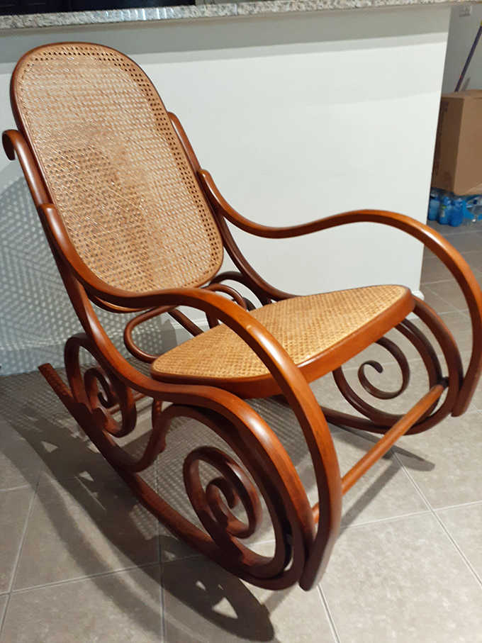 This isn't just a rocking chair; it's a throne for future storytelling sessions where grandchildren will hang on your every word.