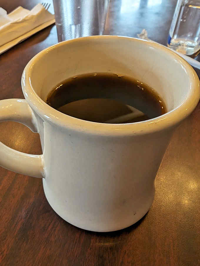 That perfect diner coffee &ndash; strong enough to wake you up, served in a mug substantial enough to feel like a proper morning ritual.
