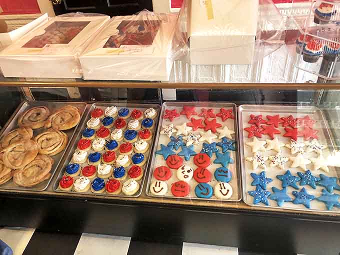 Patriotic cookies and cinnamon rolls wait their turn to be chosen, each one promising a different but equally delightful experience.
