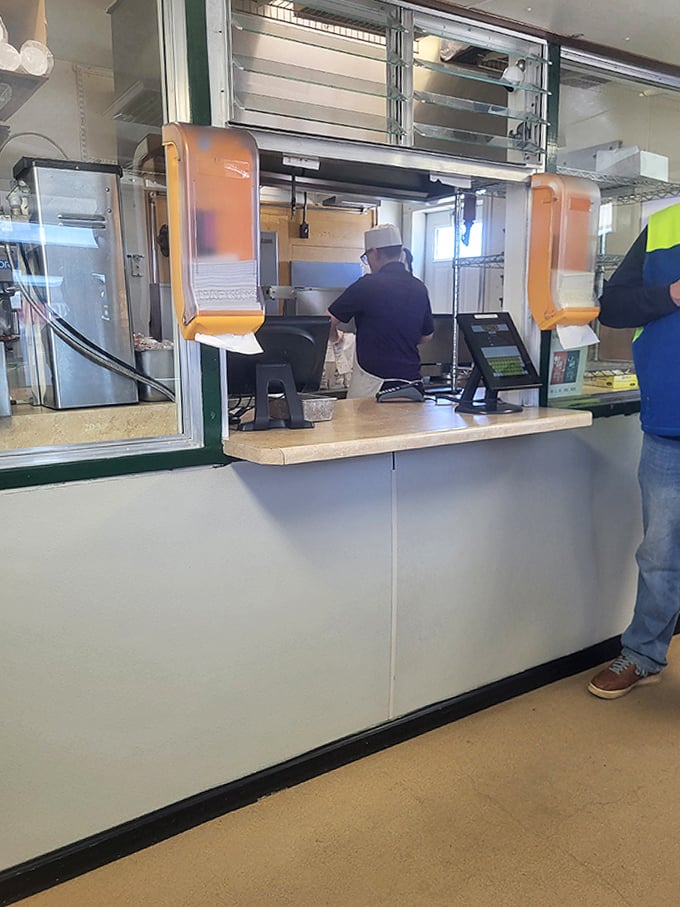 The digital menu board brings modern technology to this classic establishment without sacrificing the nostalgic charm that regulars love.