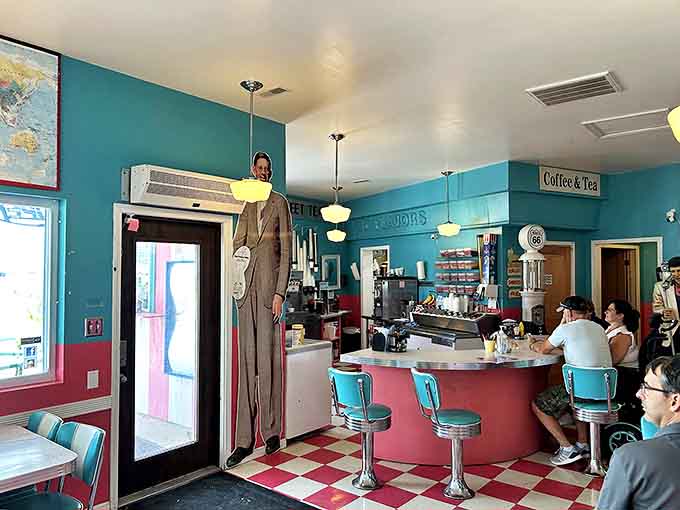 At the counter, a vintage mannequin stands tall &ndash; perhaps the world's most patient customer, waiting decades for his order without a single complaint.