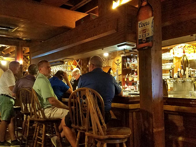 The bar area buzzes with the easy camaraderie of regulars and newcomers alike, where stories flow as freely as the generous pours.