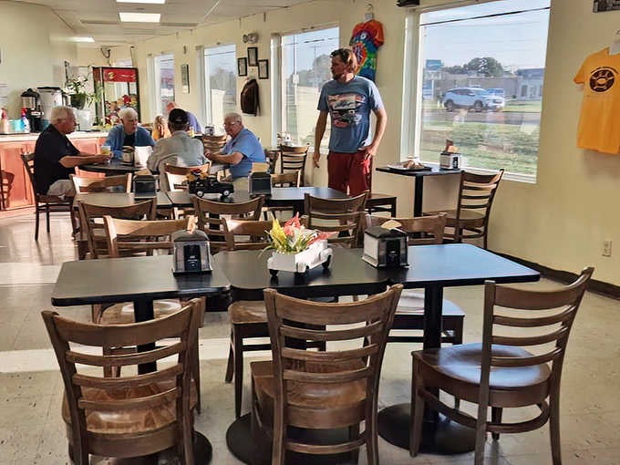 Classic diner interior where every worn spot tells a story of decades of satisfied customers.