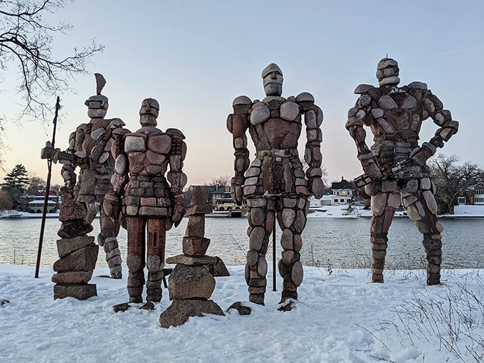 Even in winter, the Rock Guardians maintain their stoic watch, snow dusting their broad shoulders like silent sentries.