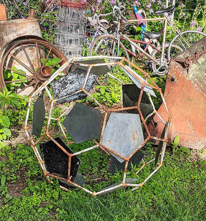 Geometric shapes in steel form remind us that math class could have been way more interesting if it involved welding and outdoor installations.