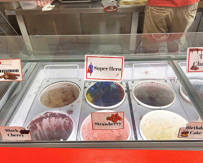 The display case at Wall's is like a frozen color wheel of possibility, from Super Hero blue to classic strawberry pink.