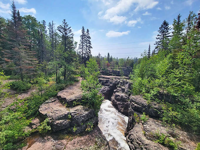 The vast wilderness stretches as far as the eye can see, reminding visitors they're just tiny specks in nature's grand design.
