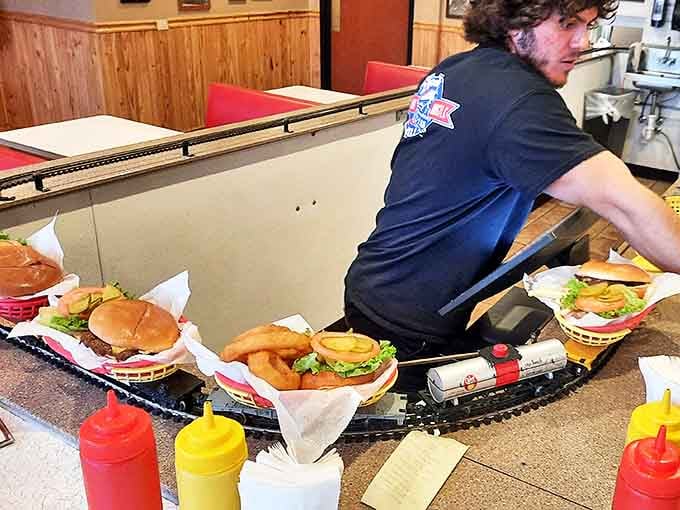 This ingenious delivery system turns every meal into dinner theater, with miniature locomotives playing the starring role in your dining experience.