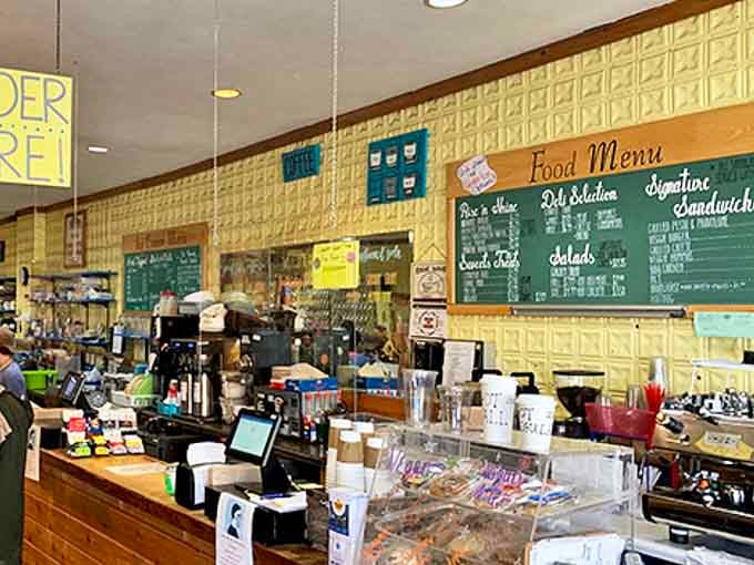 Order counter: Where coffee dreams come true, backed by a chalkboard menu of possibilities and baristas who take your caffeine seriously.