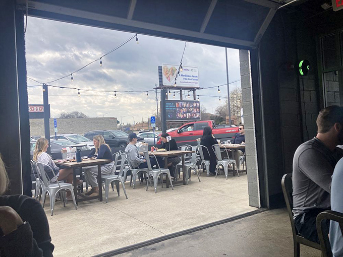 The outdoor patio at Old Scratch &ndash; where pizza tastes even better under string lights and Ohio skies.