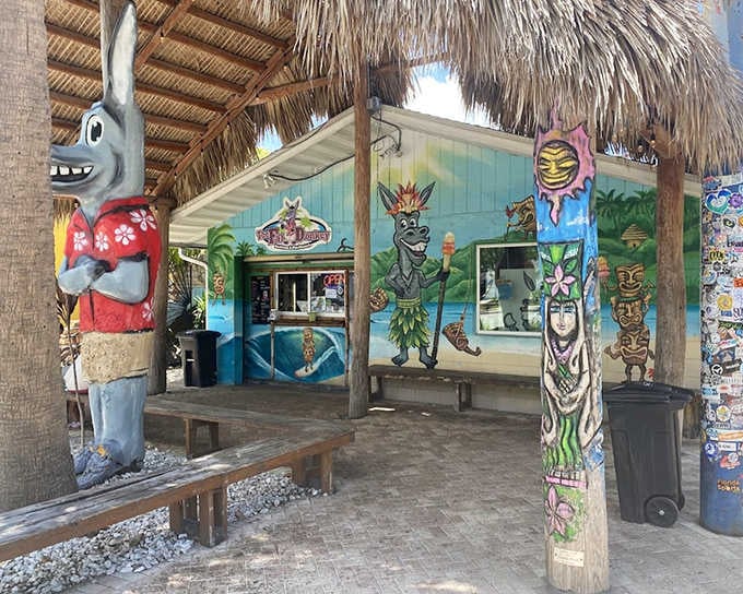 Palm fronds frame the entrance to this ice cream paradise, where the tiki-inspired decor and vibrant murals promise a dessert experience worth writing home about.