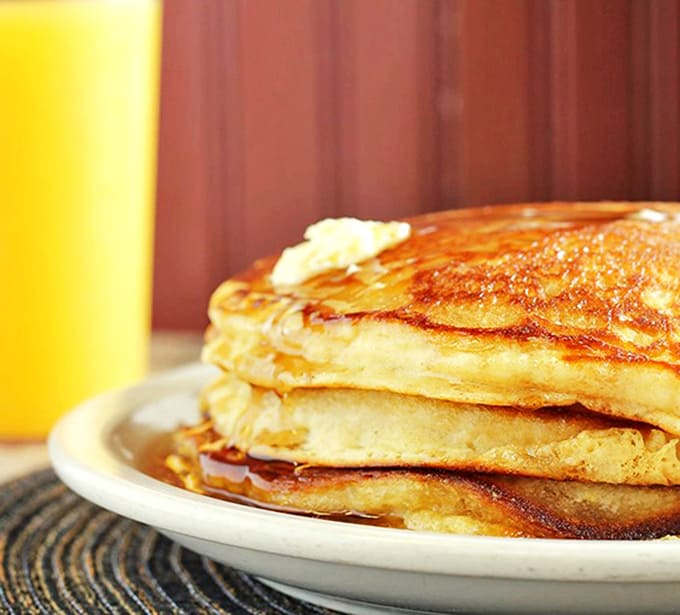 Pancakes stacked higher than your weekend plans &ndash; golden, fluffy, and worth every single calorie.