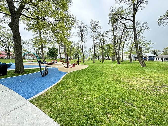 The playground equipment lets kids burn energy while parents enjoy precious moments of peace, which is basically the definition of successful family vacation planning.