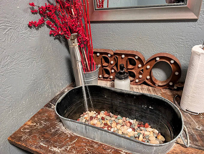 Even the sink has character at Uncle Beth's, where rustic charm meets practical necessity in the most delightful way.