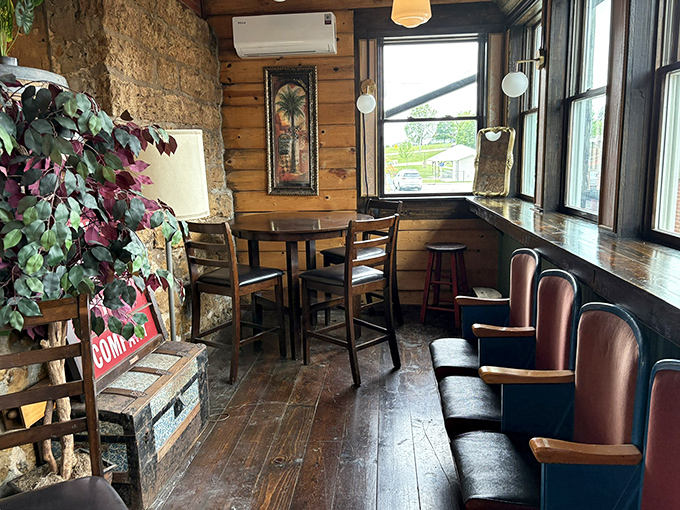 Cozy seating nook with warm wooden walls offers the perfect spot to rest your feet during your treasure-hunting adventure.