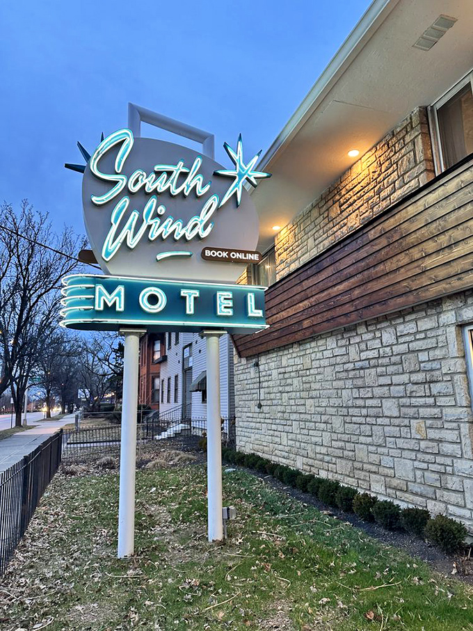 As dusk falls, the South Wind's neon signage transforms into a beacon of nostalgia against the Columbus night sky.