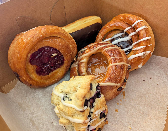 Pastries to-go, packaged with the care of precious cargo &ndash; because some treasures are meant to be enjoyed beyond the bakery walls.