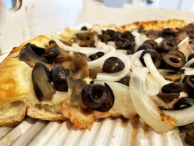 Vegetarian pizza: Who needs meat? Black olives, mushrooms, and onions prove that vegetarian options at Big Al's aren't an afterthought&mdash;they're a celebration.