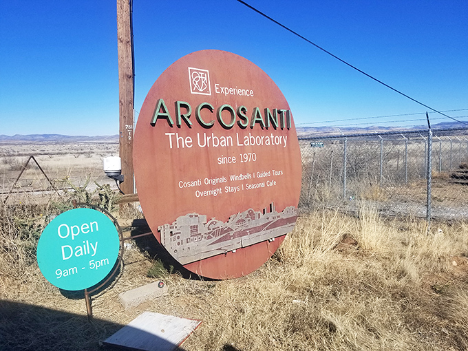 "Open Daily" promises the welcome sign, inviting curious travelers to discover this urban experiment rising from the desert floor.