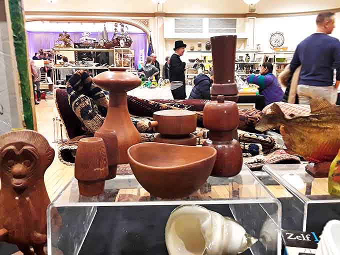 Handcrafted wooden vessels showcase the warm patina that only comes from artisanal craftsmanship and the gentle touch of time.