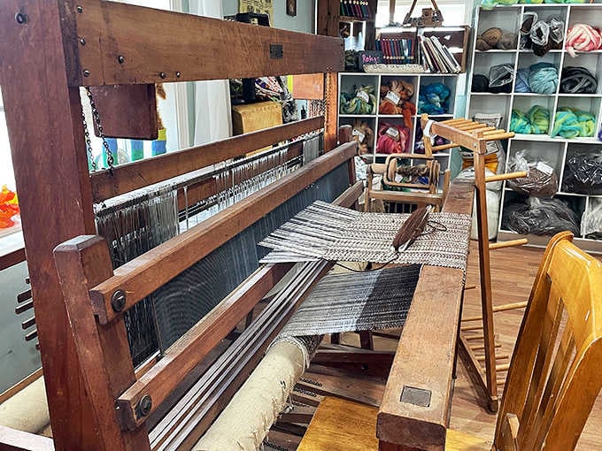 This traditional wooden loom demonstrates the timeless art of weaving, connecting modern visitors to centuries of fiber arts tradition.