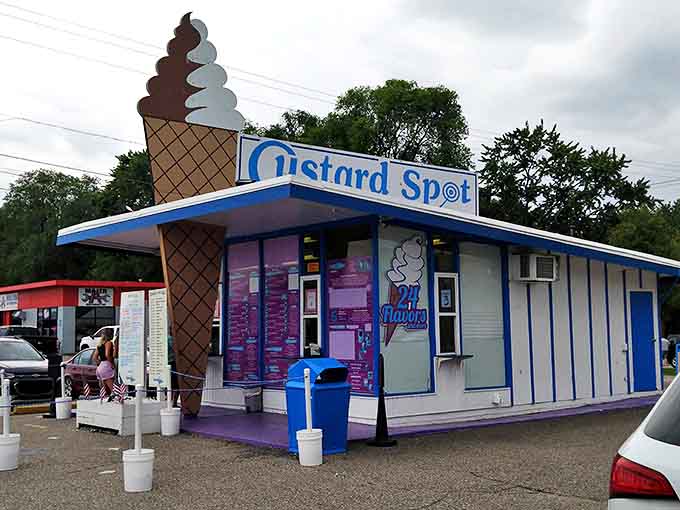 Custard Spot's eye-catching building topped with a giant ice cream cone sculpture makes it impossible to miss. The blue and white color scheme creates a cheerful beacon for frozen custard fans.