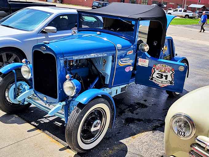 This jaunty blue Model A Ford looks like it just rolled off the set of a gangster movie, ready for a high-speed getaway.