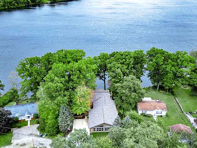 An aerial view reveals how harmoniously Cassopolis's homes nestle against Diamond Lake's shoreline, respecting nature's boundaries.
