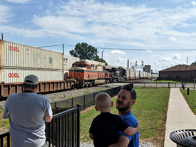 Another visitor snaps a photo of the perfect scene at Fostoria Rail Park as the train passes, its rush of air creating an unforgettable thrill.