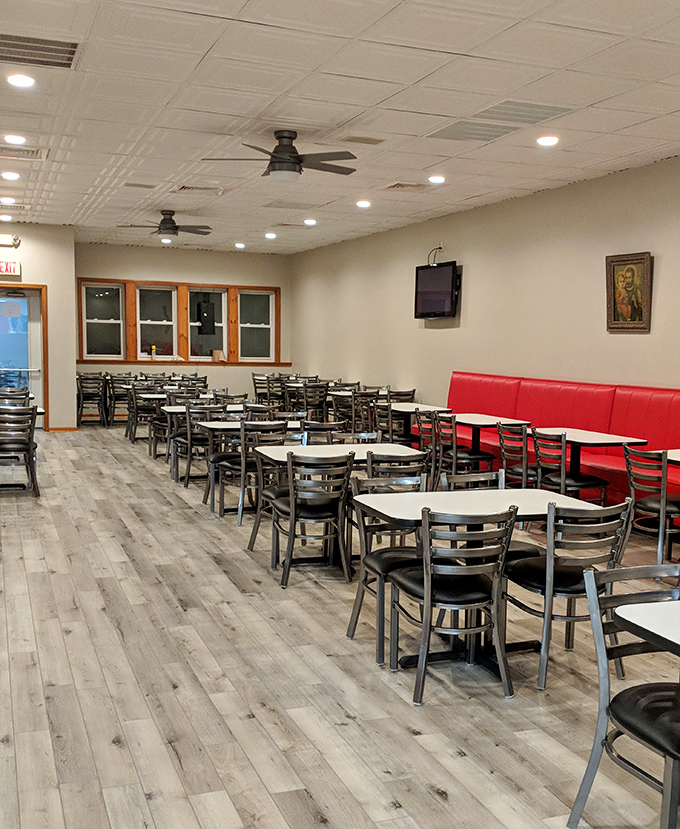 The dining room awaits the dinner rush &ndash; tables set for another evening of pizza perfection.