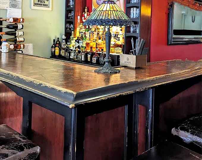 Not just a place to order drinks, but a front-row seat to the ballet of bottles and glasses that transforms spirits into something worth savoring slowly.