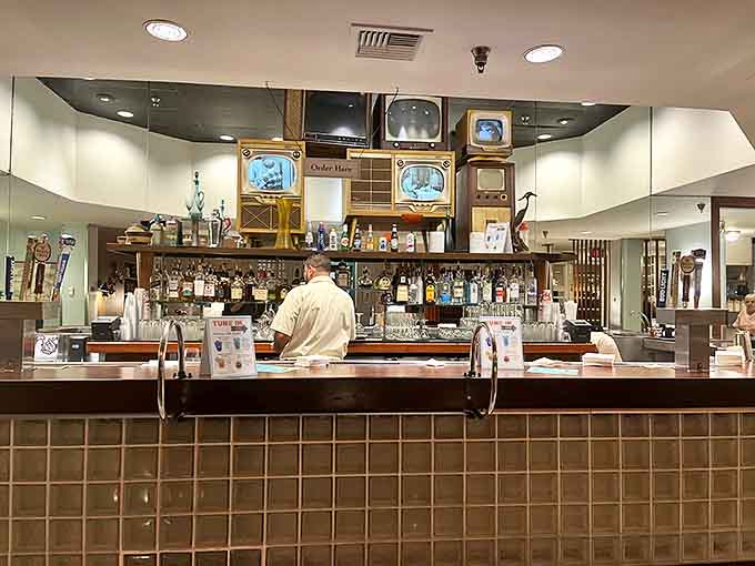 The bar area showcases an impressive selection of spirits and beers, promising liquid courage before tackling The Thurmanator challenge.