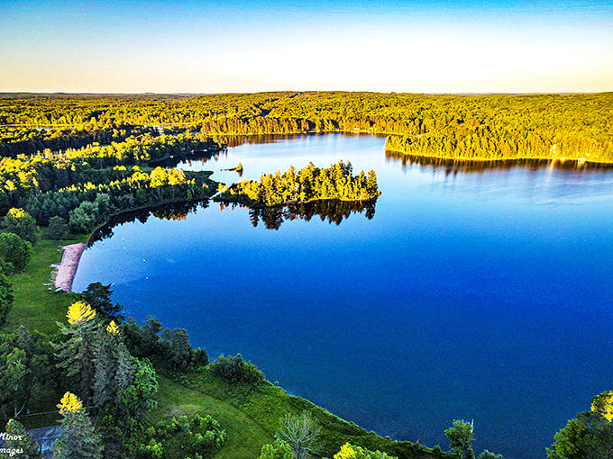 Bewabic State Park's pristine waters reflect the surrounding forest like nature's own mirror, doubling the beauty for observant visitors.