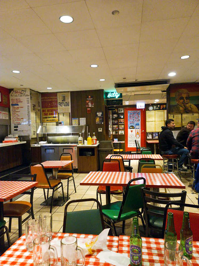 The dining area feels frozen in time &ndash; mismatched chairs, no-nonsense tables, and an atmosphere thick with decades of Chicago stories.