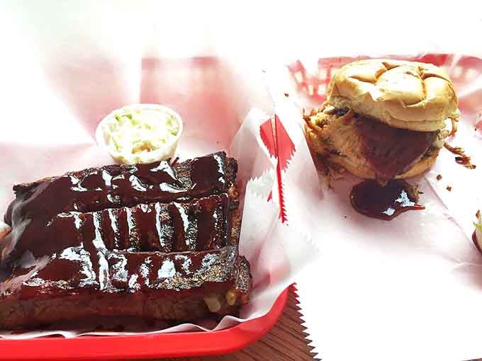 A study in contrasts: glistening ribs alongside a turkey sandwich that proves poultry deserves its place at the barbecue table.